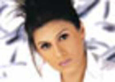 Rushali's happier! - Times of India