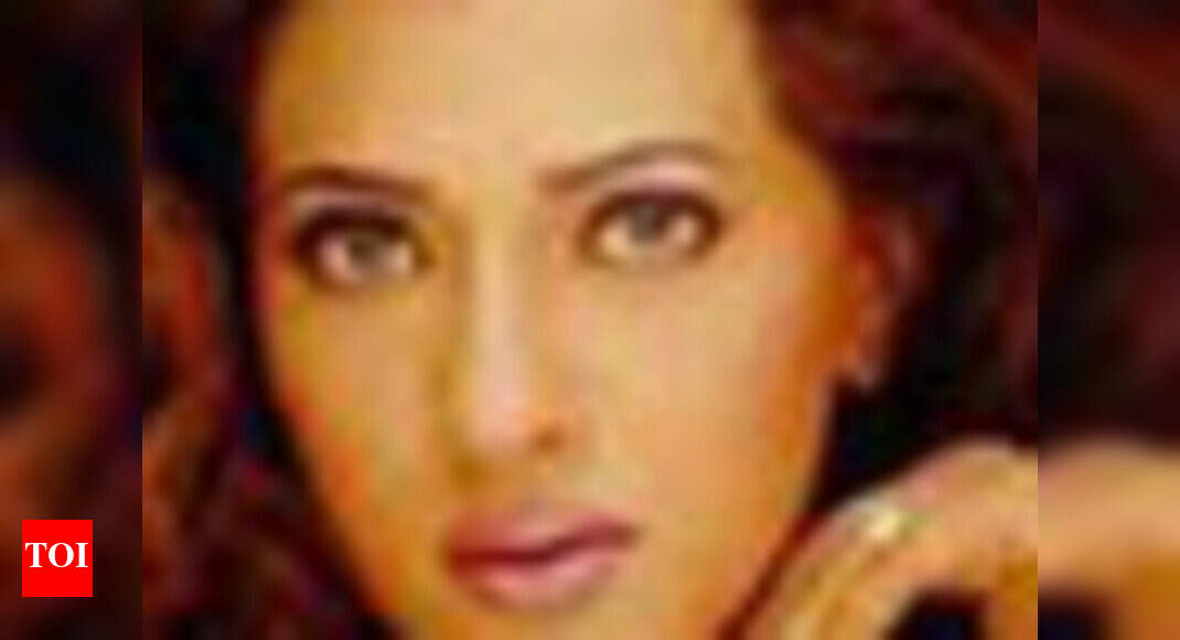 Usha's got to get some new pics - Times of India