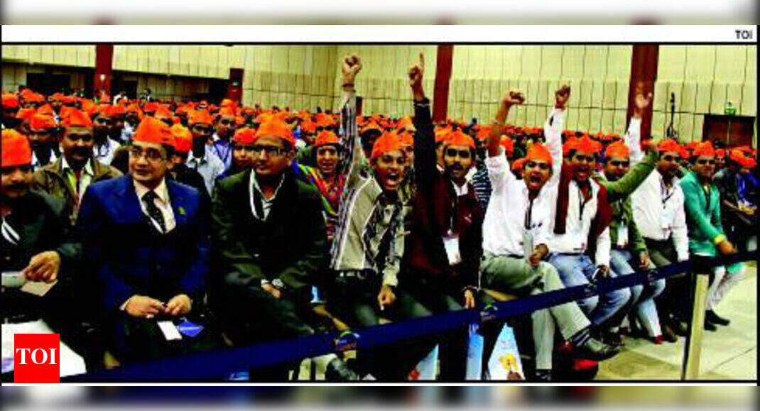 Saffron Gandhi caps surface at Modi's function | India News - Times of ...