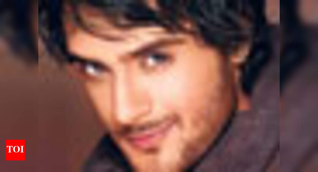 Why Angad chopped off his long hair... - Times of India