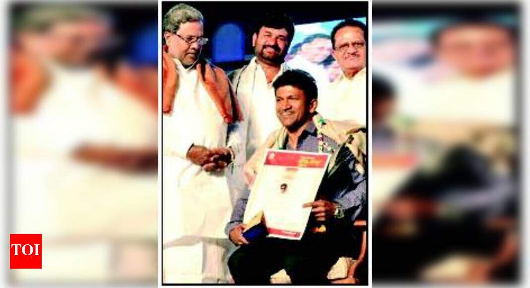 Puneeth Rajkumar Arjun Sarja Bag Best Actor Awards Kannada Movie