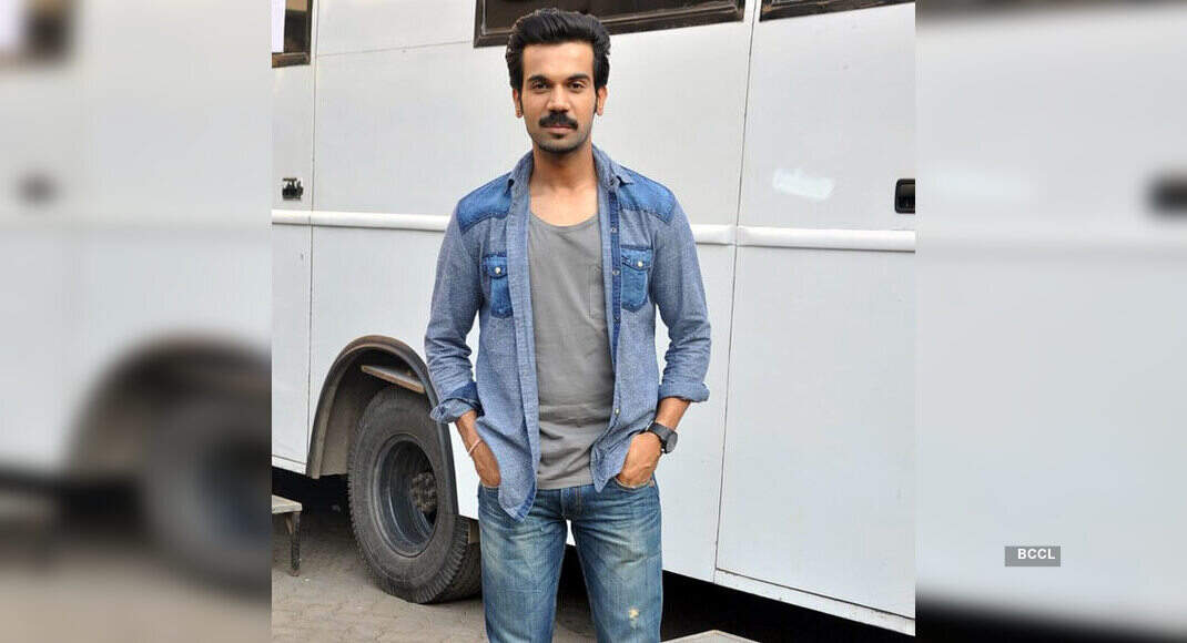 Raj Kumar Rao poses as he arrives for the press meet of movie Queen, in ...