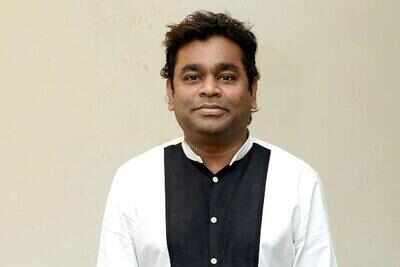 AR Rahman poses for the shutterbugs during the performance by his ...