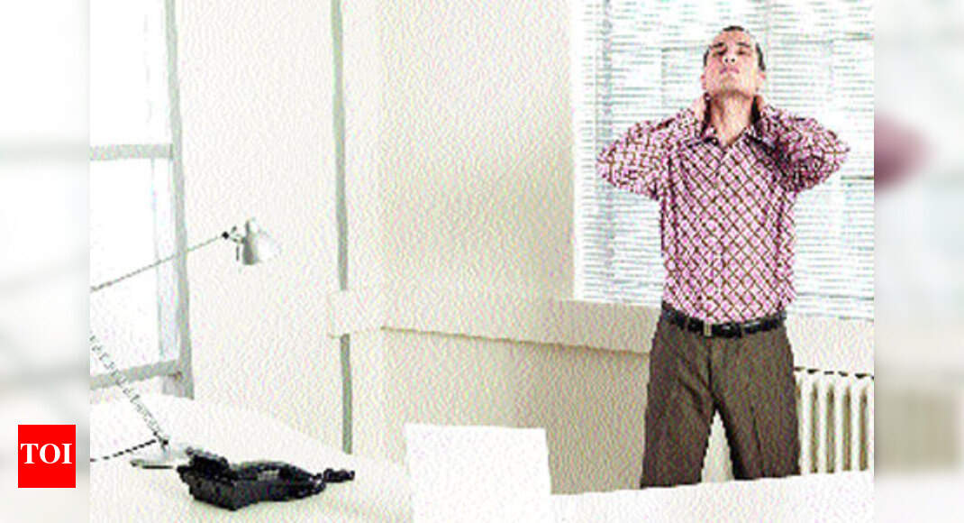 Exercises you can do at your work desk - Times of India
