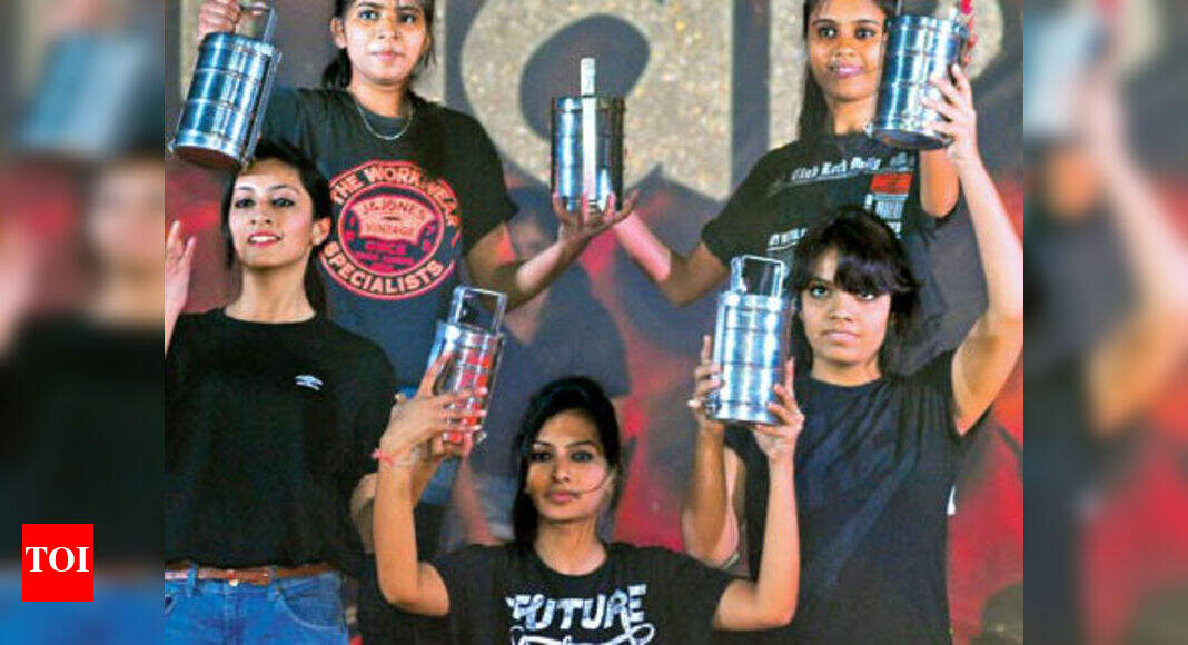 Students of an engineering college walk the ramp wearing newspaper ...