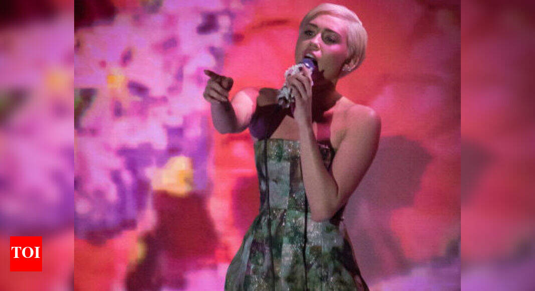 Miley Cyrus, assistant tattoo each other | English Movie News - Times ...