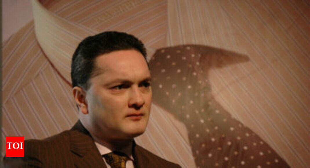 Raymond may sell up to 20% to private equity investors - Times of India