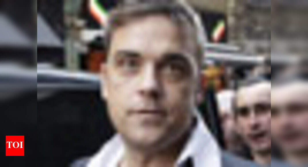 Robbie hires Chalmers to boost image | English Movie News - Times of India