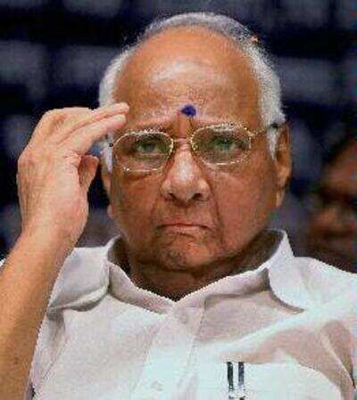 Sharad Pawar: No grouse against Sonia, Chavan to blame - Times of India