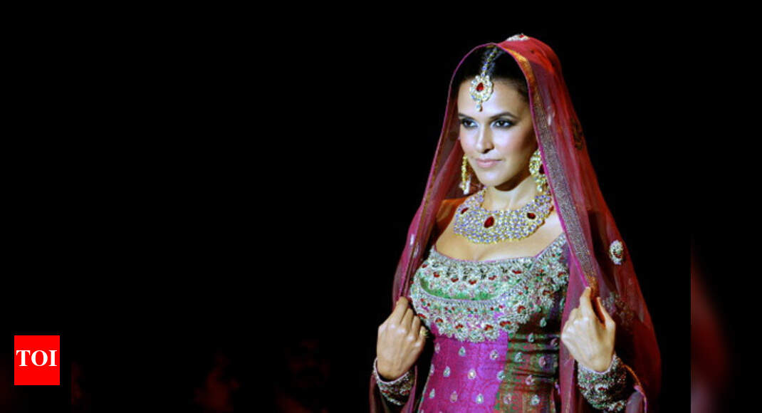 Neha Dhupia: I want Karan Johar to direct me | Hindi Movie News - Times ...