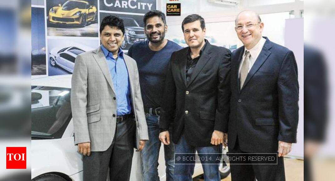 Cyrus Nallaseth, Faisal N Ahmad and Rowan Fernandes at the launch of ...