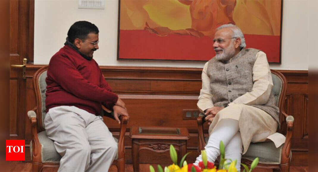 Arvind Kejriwal meets PM Narendra Modi, invites him for swearing-in ...