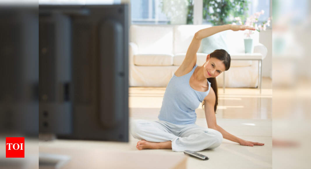 Exercises you can do while watching TV - Times of India