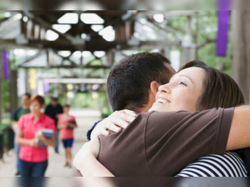 Care for a Hug? - Times of India
