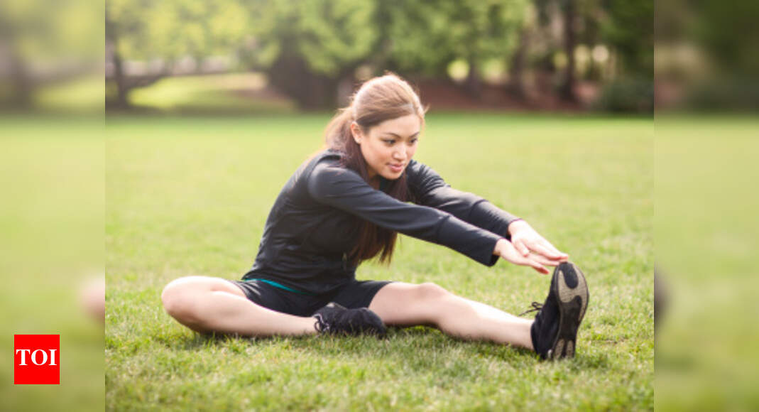 Must-do pre and post workout stretches - Times of India
