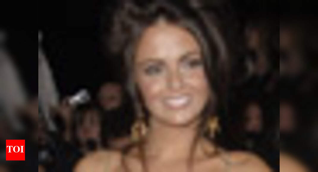 Metcalfe mud wrestles in a steamy ad | English Movie News - Times of India