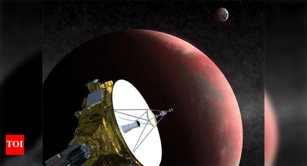 Spacecraft gets up close with Pluto - Times of India