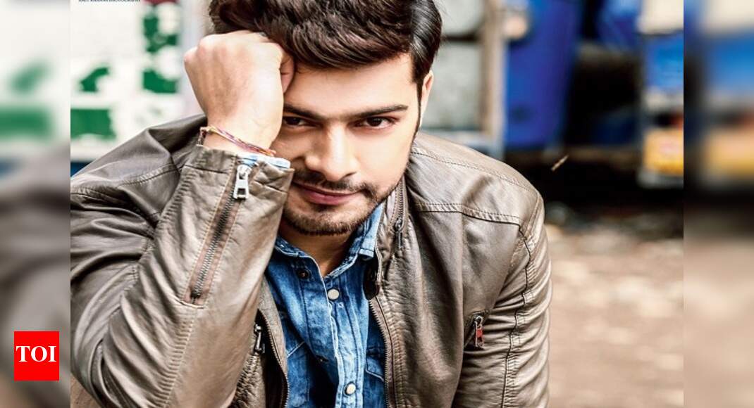 Karam gets his parents’ names inked on his back - Times of India