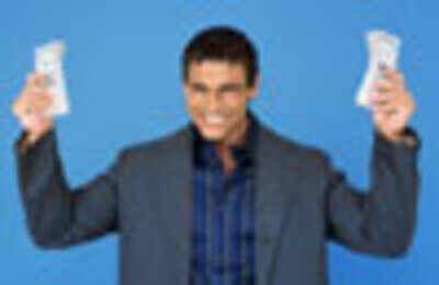 It's official: Money doesn't improve quality of life - Times of India