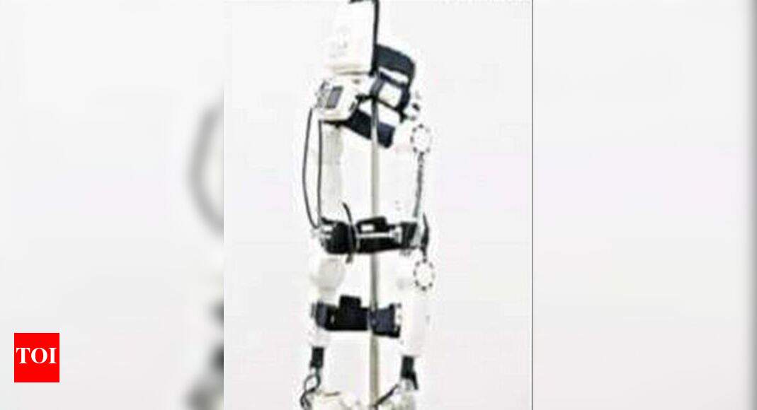 Robotic suit helps paralytic man move - Times of India