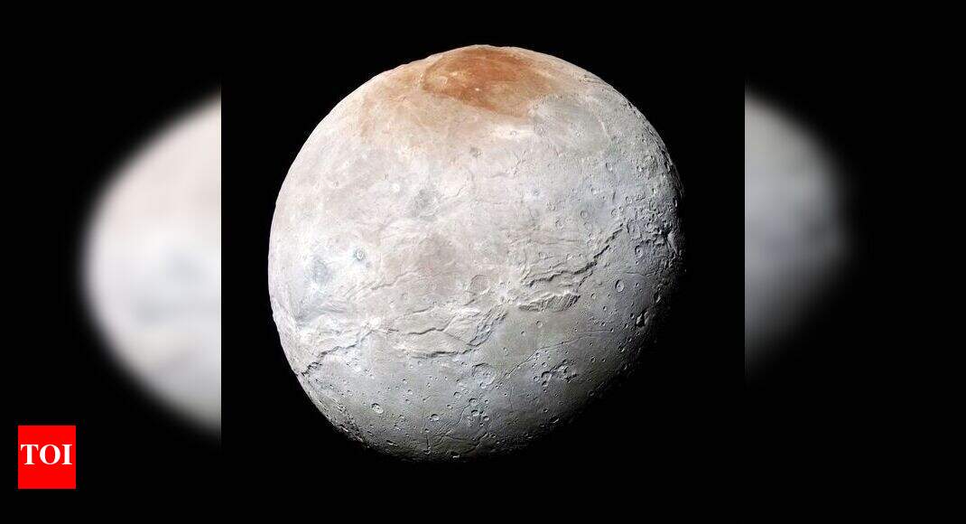 Nasa captures Pluto's moon Charon in stunning detail - Times of India