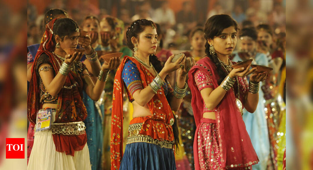 Bright colours and fancy fabrics galore, this Navratri - Times of India