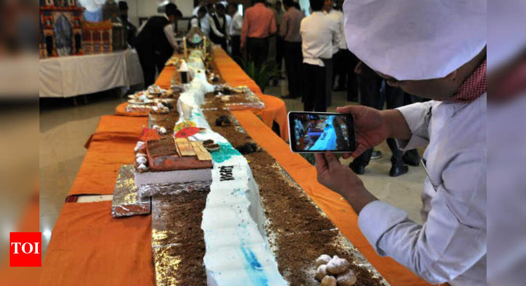 IHM students bake 50-foot long cake to celebrate Ganga | India News ...