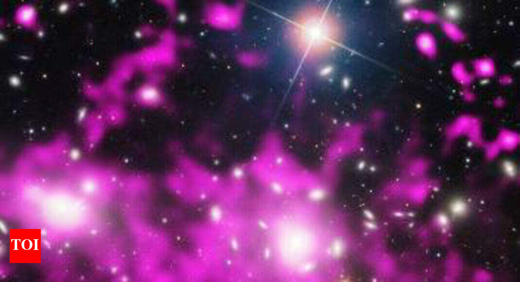 Dust doughnut around massive black hole is clumpy, study shows - Times ...