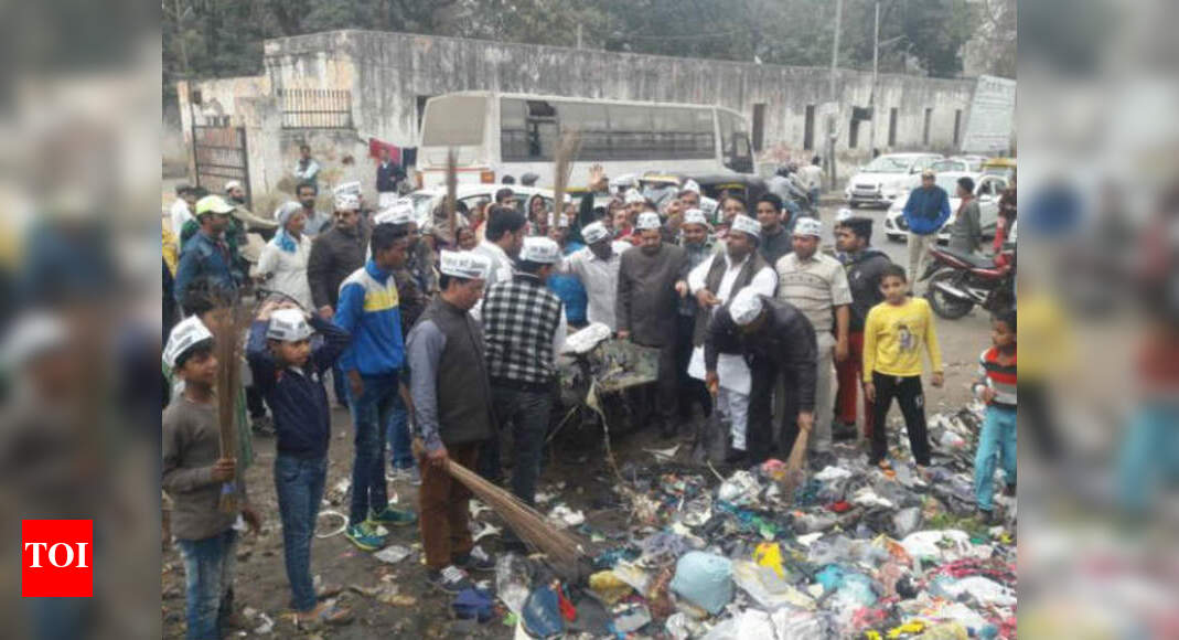 Delhi garbage crisis: AAP ministers pick up brooms as sanitation ...