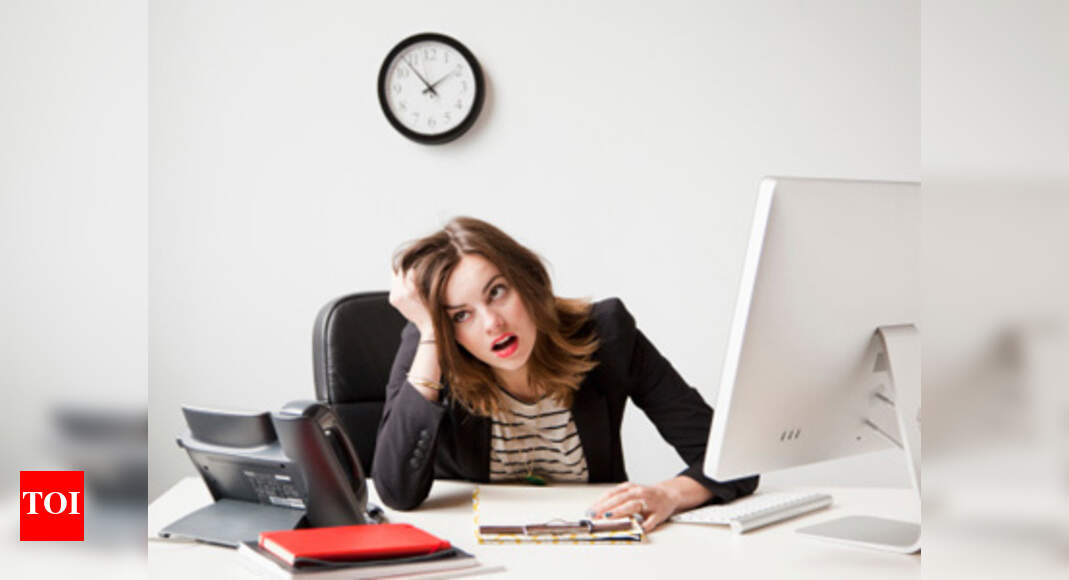 Here’s why people feel miserable while at work - Times of India