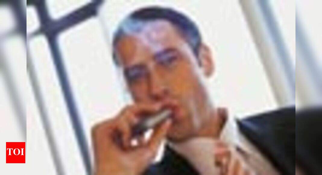 Smoking can cause chronic lower back pain - Times of India