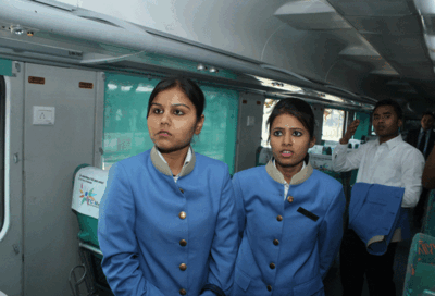 Train hostess and host in Gatimaan express | Agra News - Times of India