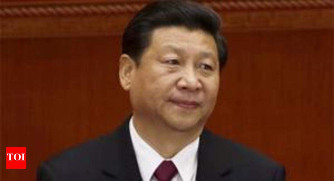 Xi becomes commander in chief of China's armed forces - Times of India