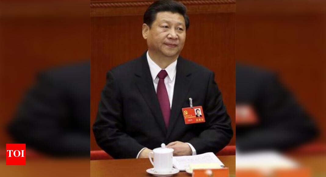 Xi becomes commander in chief of China's armed forces - Times of India