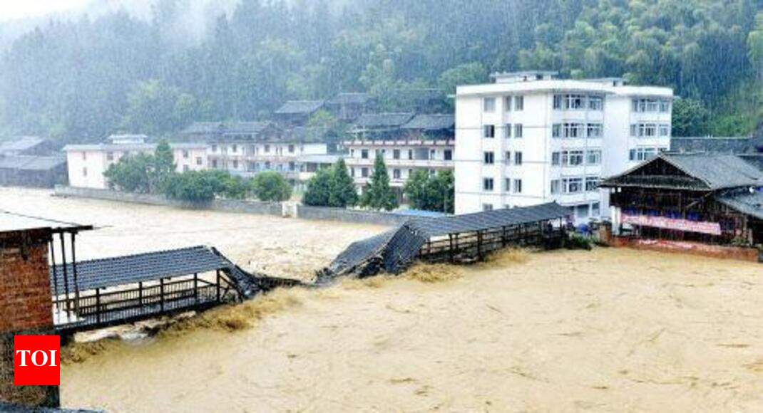 Heavy rains kill nine people in southern China - Times of India