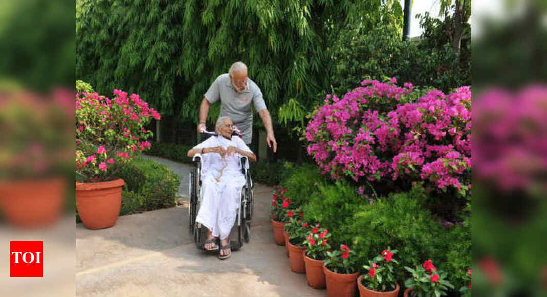 PM Narendra Modi's mother visits his official residence for the first ...
