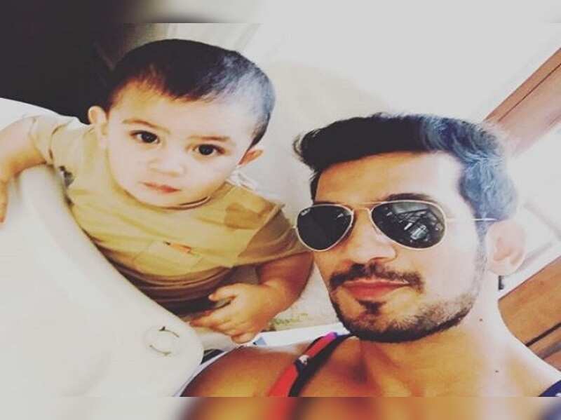 WATCH: Super cute video of Arjun Bijlani's son copying SRK - Times of India