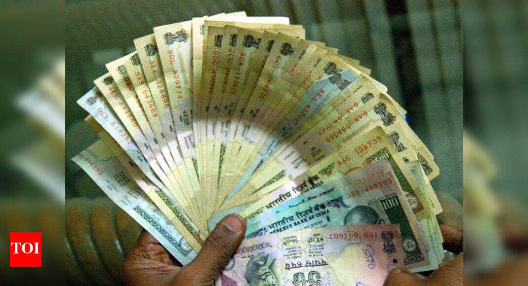 RBI sets rupee reference rate at 67 against US dollar - Times of India
