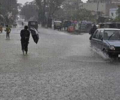 Surat relishes in first heavy rains of monsoon on Sunday | Surat News ...