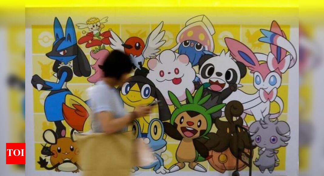 Woman gets stuck in tree while playing Pokemon Go - Times of India