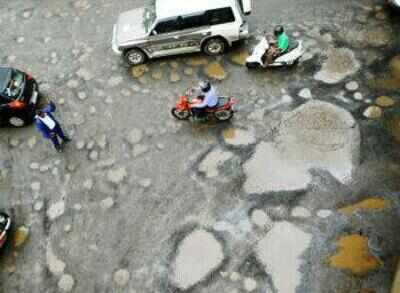 Princess and Frog artwork gets potholes fixed in Bengaluru | Bengaluru ...