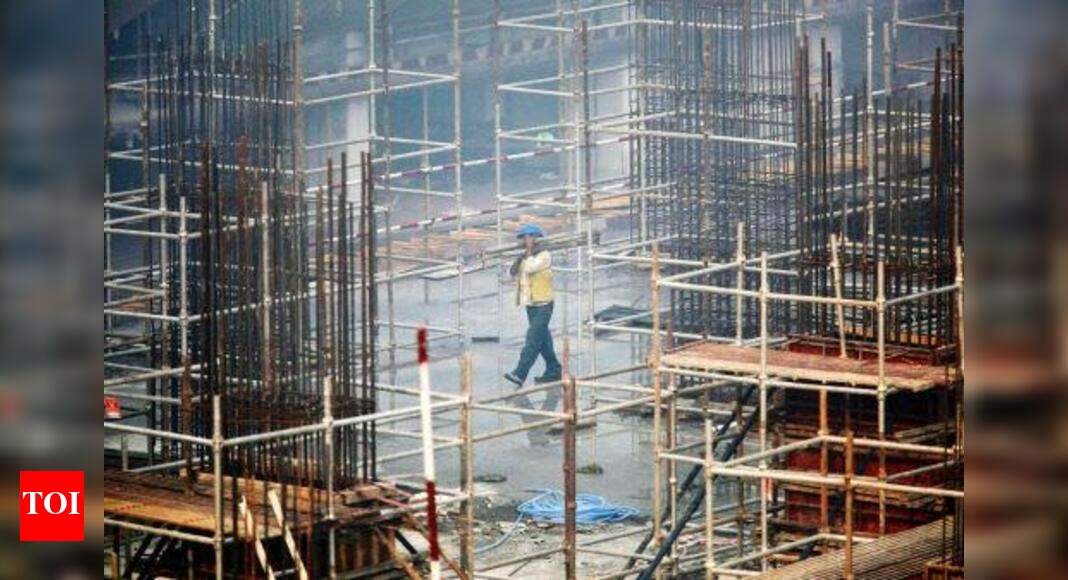 2 workers fall off under-construction building without safety net ...