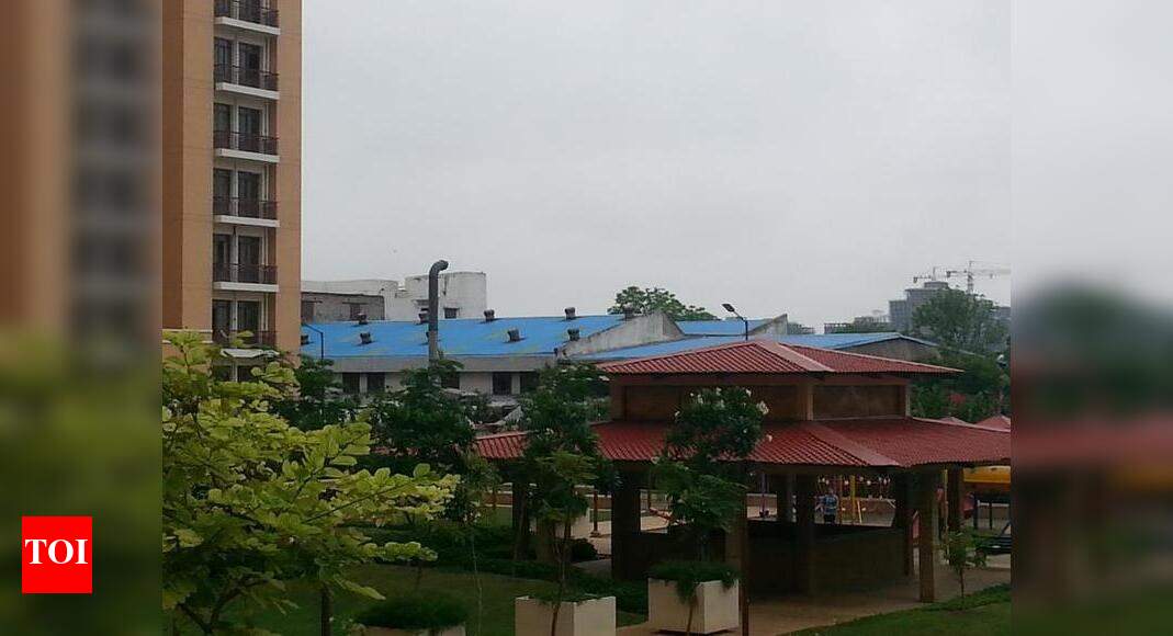 GGN apartments next to smoky factory - Times of India