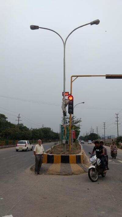 Hoarding blocking view of Noida signal removed - Times of India