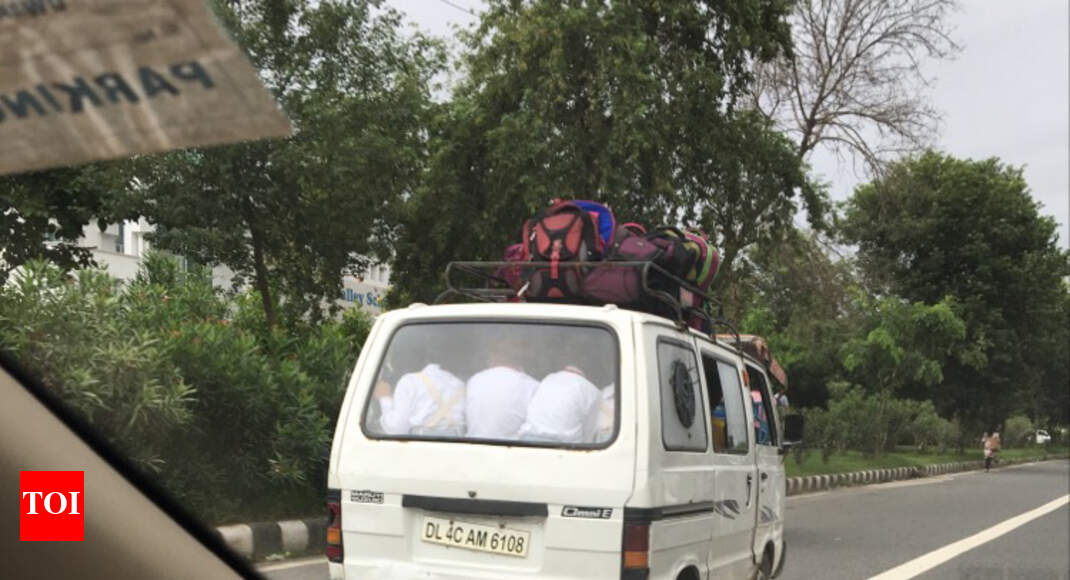 Overloaded school bus in dwarka - Times of India