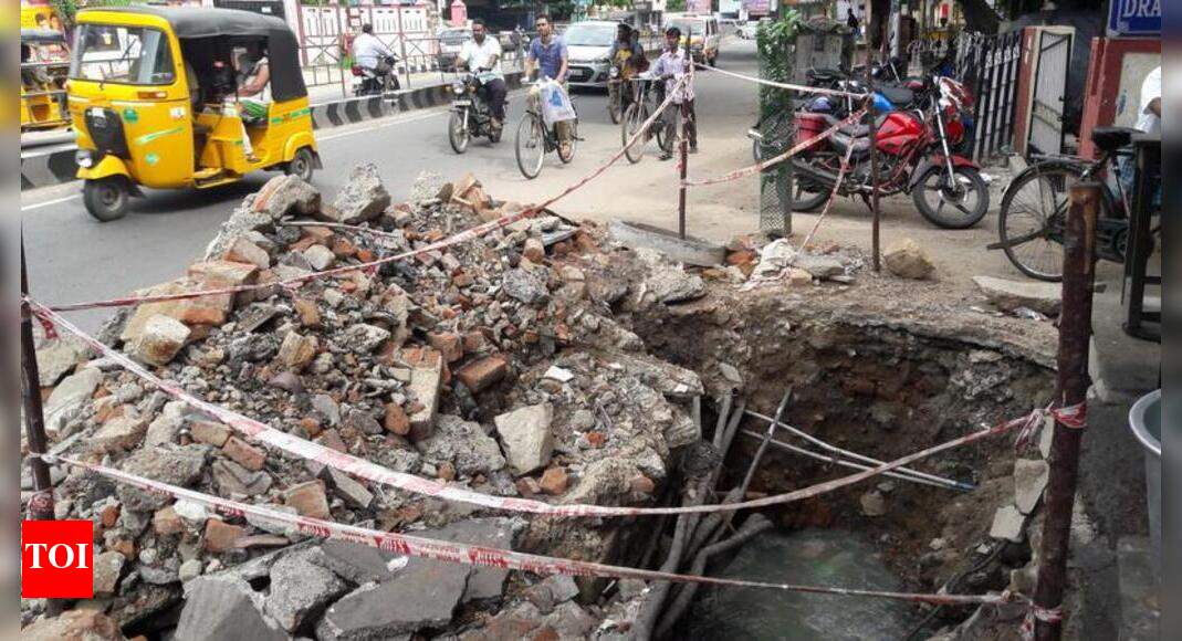 Open drain on busy road - Times of India