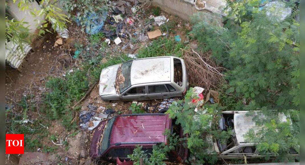 Cars, waste, even an open loo - Times of India