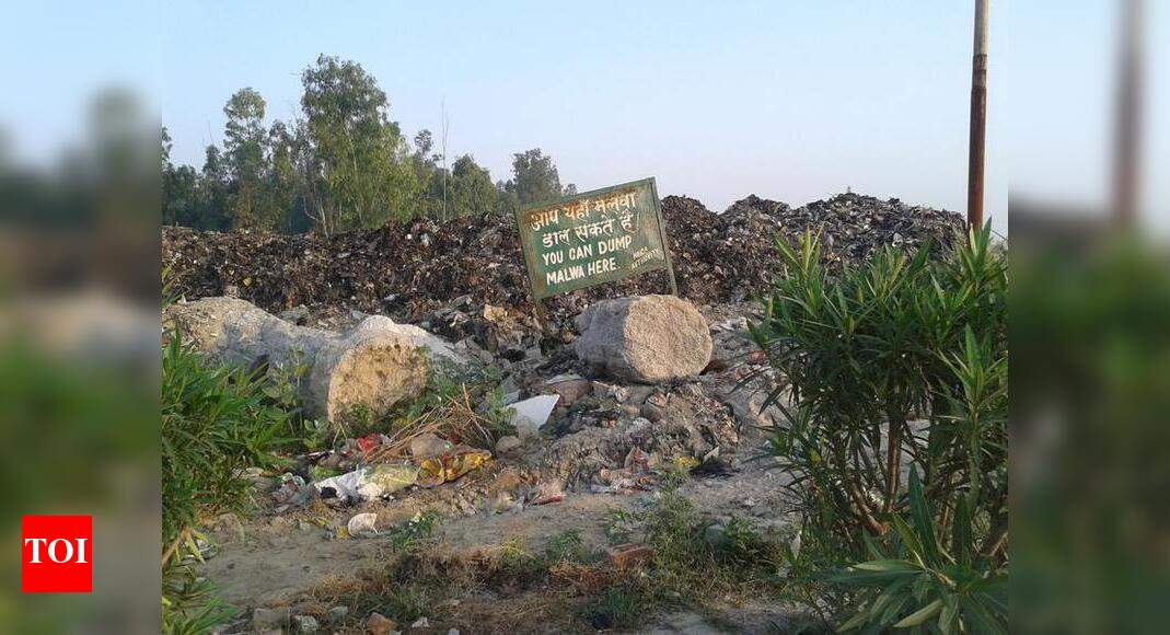 Garbage piles up - Times of India