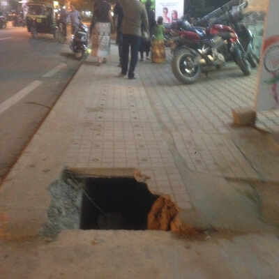Kasavanahalli’s broken footpath - Times of India