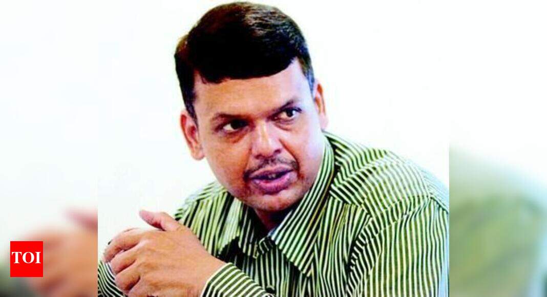 Photo goof-up blame on induction spree | Pune News - Times of India